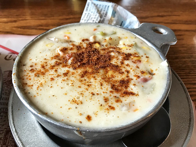 This isn't just corn chowder&mdash;it's a warm, creamy hug in a bowl, topped with a sprinkle of spice that whispers, "Take your time, the prime rib can wait."