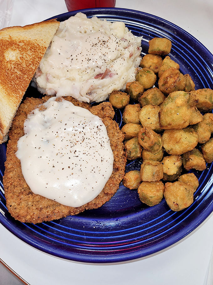 Country fried steak with gravy so good you'll want to write home about it&mdash;if you weren't too busy using your toast to soak up every last drop.