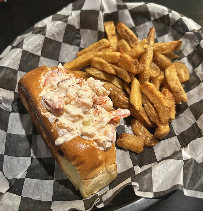 This isn't just a sandwich&mdash;it's a seafood celebration on a bun. The lobster roll comes with perfectly golden fries that demand to be savored one by one.