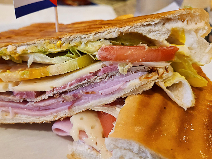 The Cuban sandwich in all its pressed, layered glory. Architecture students should study how these ingredients create such perfect structural harmony.