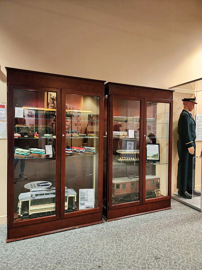 Miniature marvels! The museum's display cases house perfectly crafted model trolleys, alongside a conductor mannequin standing at attention, ready for his next shift.