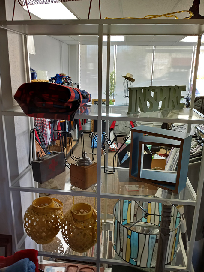 
Every shelf tells a story. That "INSPIRE" sign isn't just decor&mdash;it's the thrift store's silent mission statement for shoppers and their homes alike. 