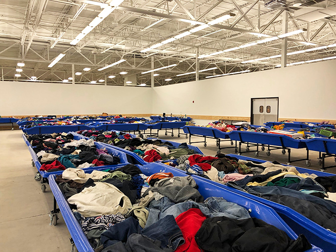 The outlet section's blue bins offer a more adventurous treasure hunt. Like archaeological digs where the artifacts are vintage band t-shirts and barely-worn jeans.