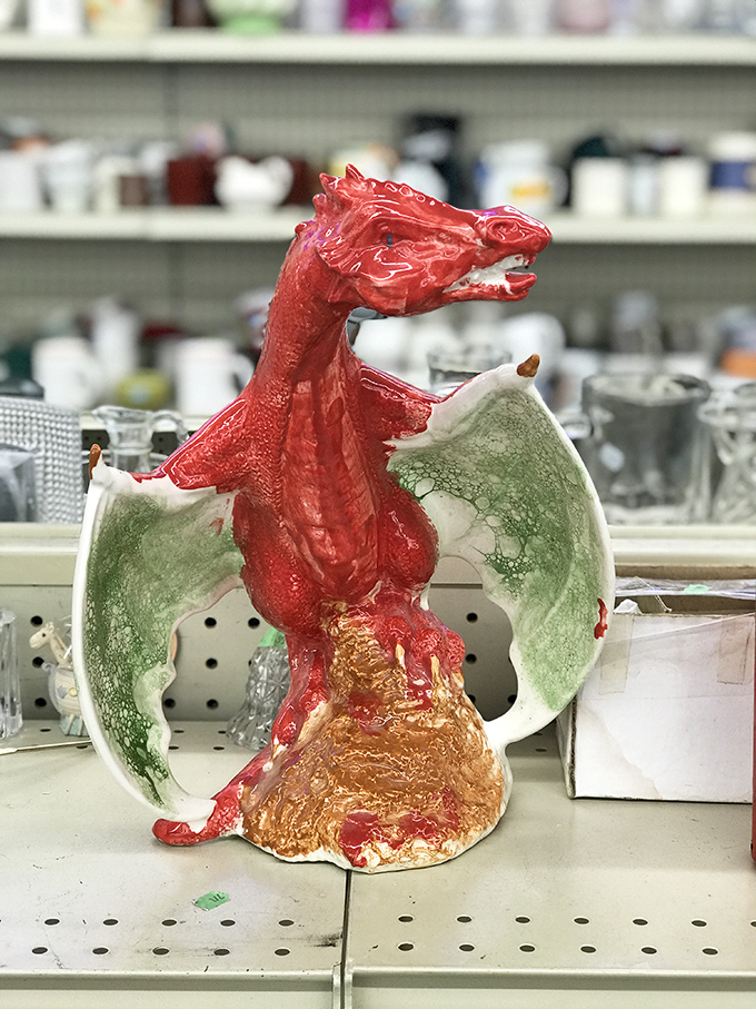Meet the guardian of aisle seven&mdash;a ceramic dragon that's either kitsch perfection or the coolest conversation piece your bookshelf desperately needs.