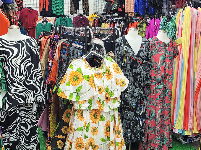 A kaleidoscope of patterns and colors hangs in perfect disorder, where sunflower dresses bloom next to zebra prints year-round.