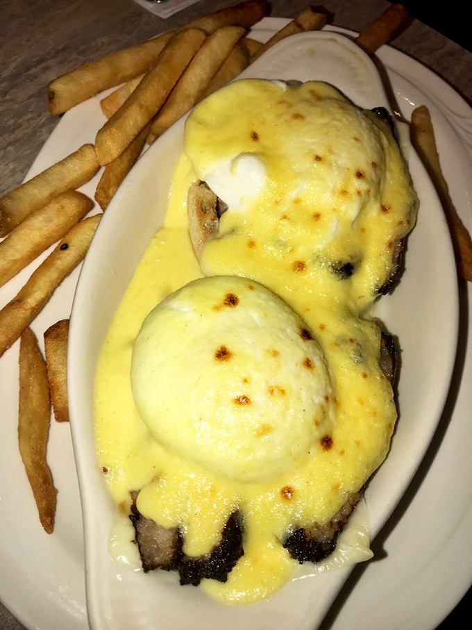 Eggs Benedict that defies gravity and good sense. Those perfectly poached eggs under a blanket of hollandaise are what breakfast dreams are made of. 