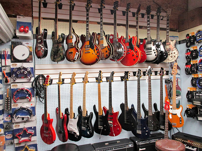 Guitar heaven for players and dreamers alike. Each instrument hanging here represents someone's abandoned rock star fantasy&mdash;or your next garage band comeback.