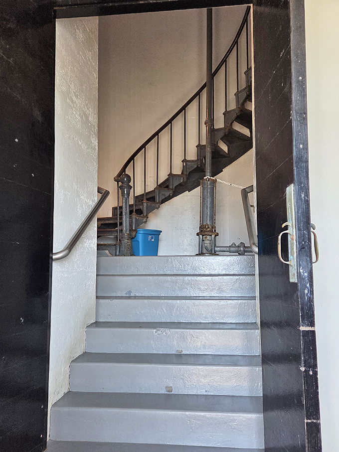 The entrance to adventure! These stairs have witnessed countless keepers trudging upward, oil cans in hand, to keep ships safe.