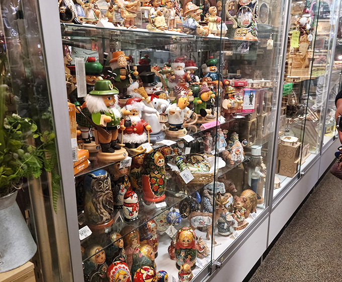 Figurines that tell stories line these glass shelves like characters waiting for their cue. Each handcrafted piece carries the personality of its creator. 