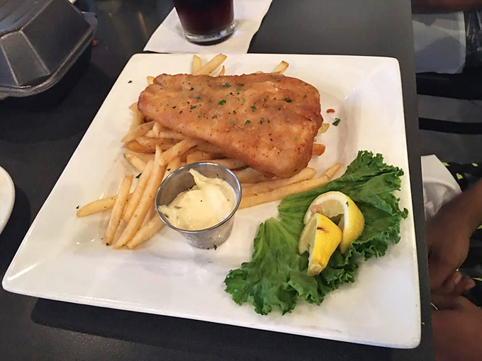 Fish and chips that would make a British pub jealous. Golden, flaky fish perched atop perfectly crisp fries&mdash;the ultimate comfort food gets the Florida treatment.