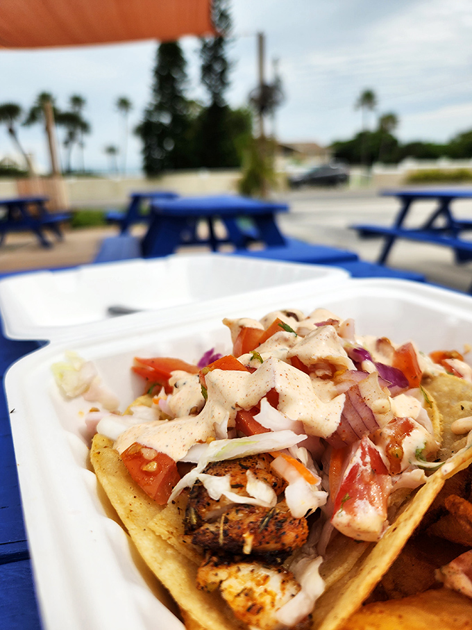 Behold, the hero of our story! Blackened fish nestled in a tortilla cradle, adorned with fresh toppings and a sauce that deserves its own fan club.