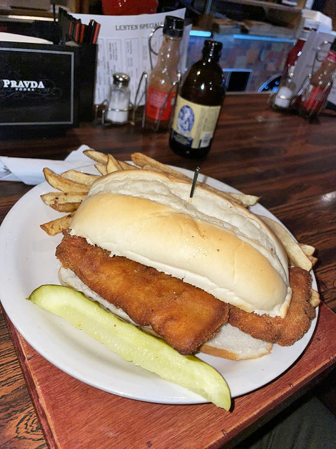 The legendary fish sandwich in all its glory&mdash;a golden-battered cod masterpiece that hangs off the bun with delicious defiance. Worth every napkin.