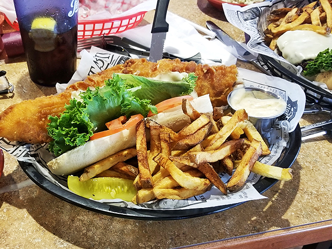 Not just any fish sandwich&mdash;this is the Moby Dick of fried fish creations. Golden-battered perfection nestled alongside hand-cut fries that would make a Frenchman weep with joy.