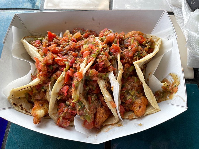 These aren't just tacos&mdash;they're edible architecture. Layers of crispy fish, fresh salsa, and cabbage creating a perfect harmony that would make Mozart jealous.