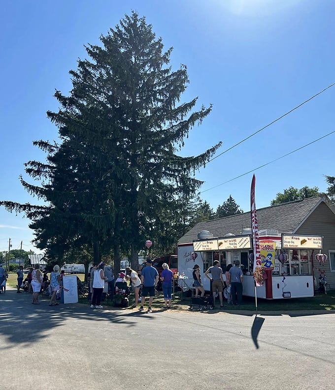 Nothing fuels a flea market expedition like a snack break. This charming food stand draws hungry treasure hunters with promises of classic fair treats.