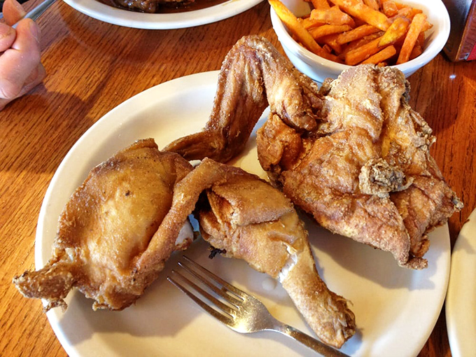 Golden-brown perfection that makes you question every other fried chicken you've ever eaten. The crackling skin gives way to juicy meat that's worth every napkin.