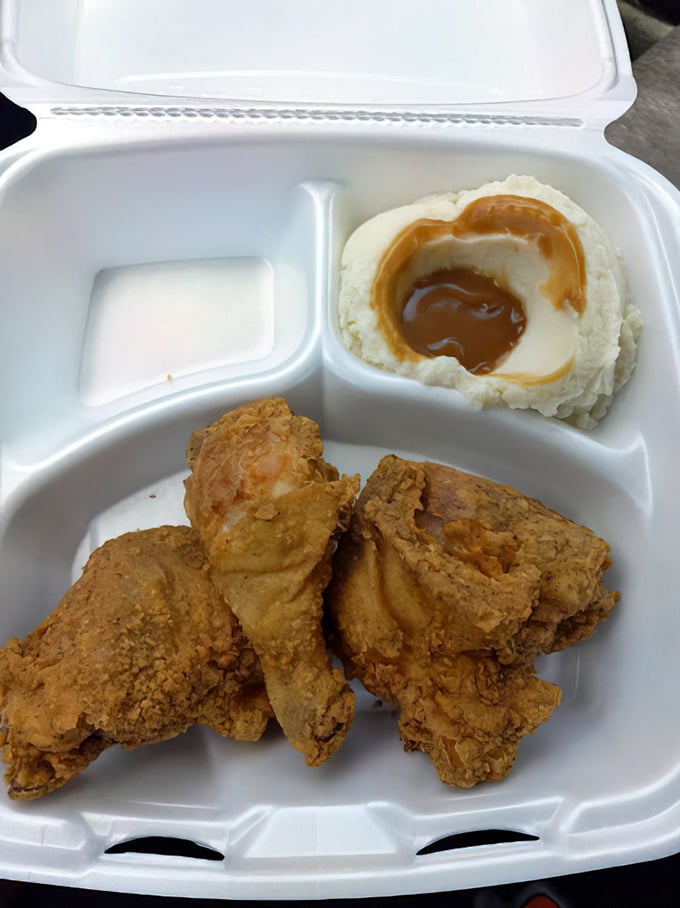 Golden-brown perfection meets cloud-like mashed potatoes. This isn't just fried chicken &ndash; it's edible Southern poetry.