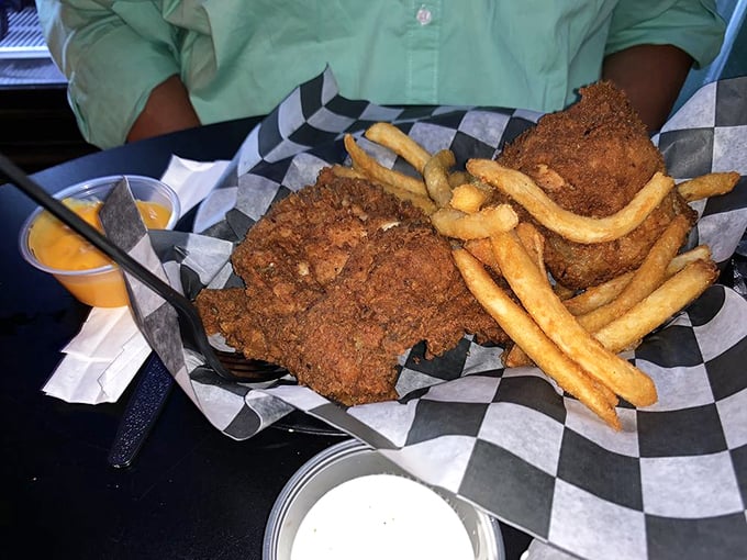 This golden-brown fried chicken achieves the impossible trinity: shatteringly crisp exterior, juicy interior, and seasoning that makes your taste buds stand up and applaud.