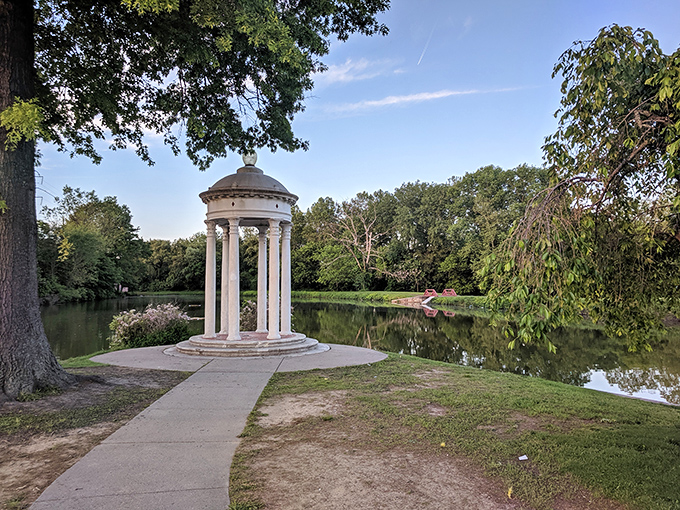 Classical elegance meets waterfront serenity. This gazebo looks like it's waiting for a string quartet or your next contemplative moment.