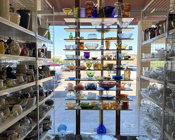 A kaleidoscope of vintage glassware catches the Arizona sunlight, each piece telling stories of dinner parties and special occasions from decades past.
