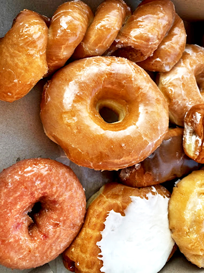 Glazed perfection in its natural habitat. If these donuts could talk, they'd simply say, "Resistance is futile."