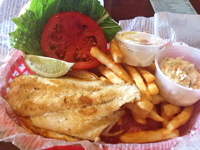 This grouper sandwich isn't just lunch &ndash; it's a masterclass in simplicity, where fresh fish, crispy fries, and Florida sunshine combine to create edible poetry.