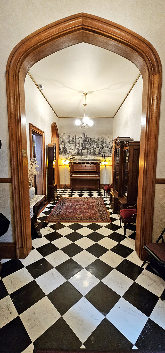 Step across this checkerboard floor and through that Gothic archway, and suddenly your apartment's IKEA furnishings seem woefully inadequate.