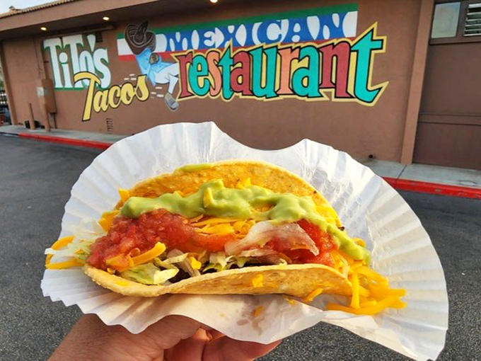 Taco perfection doesn't need fancy plating. That perfect ratio of crisp shell, seasoned beef, shredded lettuce, cheese, and house salsa is culinary poetry.