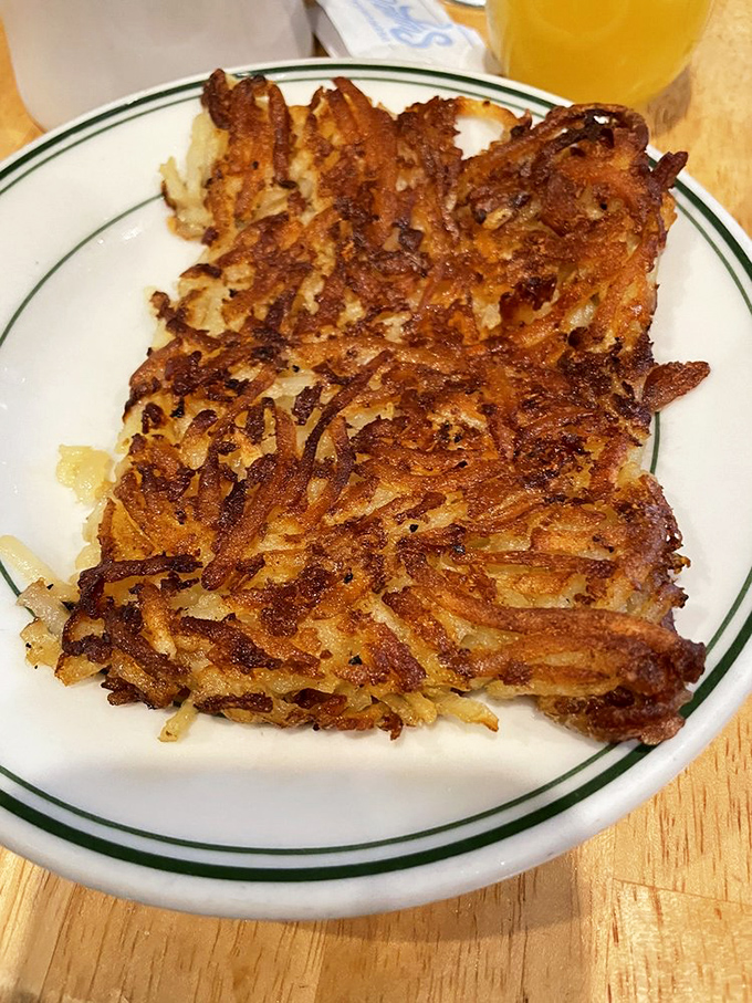 These hash browns aren't just crispy—they're the gold standard of potato perfection, with that ideal ratio of crunchy exterior to tender interior.