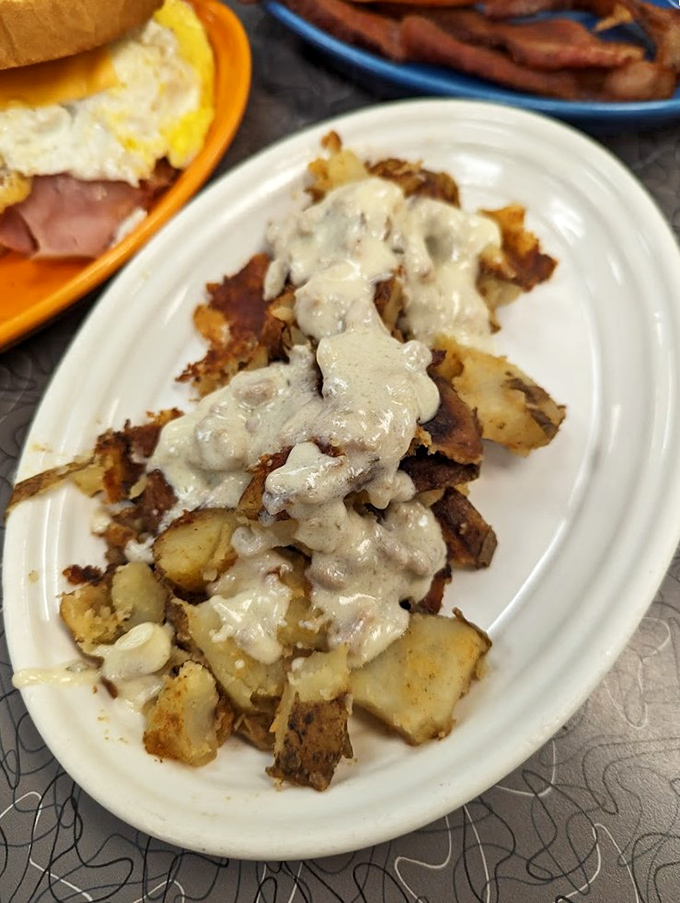 Behold the legendary home fries&mdash;crispy, seasoned chunks of potato perfection topped with creamy gravy. Resistance is futile, seconds are inevitable.