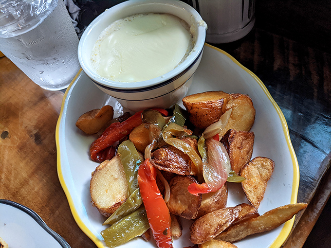 These aren't just home fries&mdash;they're potato perfection. Crispy exteriors, pillowy interiors, and those caramelized peppers and onions? Breakfast nirvana.