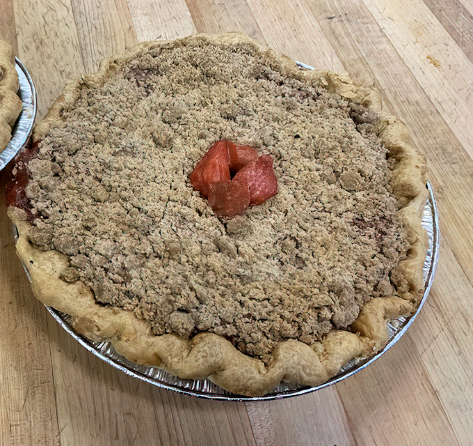 Behold the crumb-topped masterpiece that makes store-bought pies weep tears of artificial shame and regret.