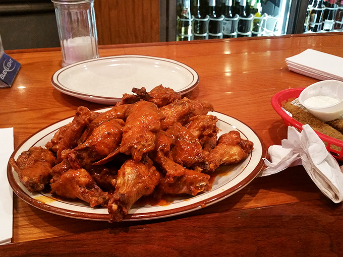 Wing perfection isn't complicated&mdash;just perfectly executed. These sauce-slathered beauties make you understand why people drive for hours just for a taste.