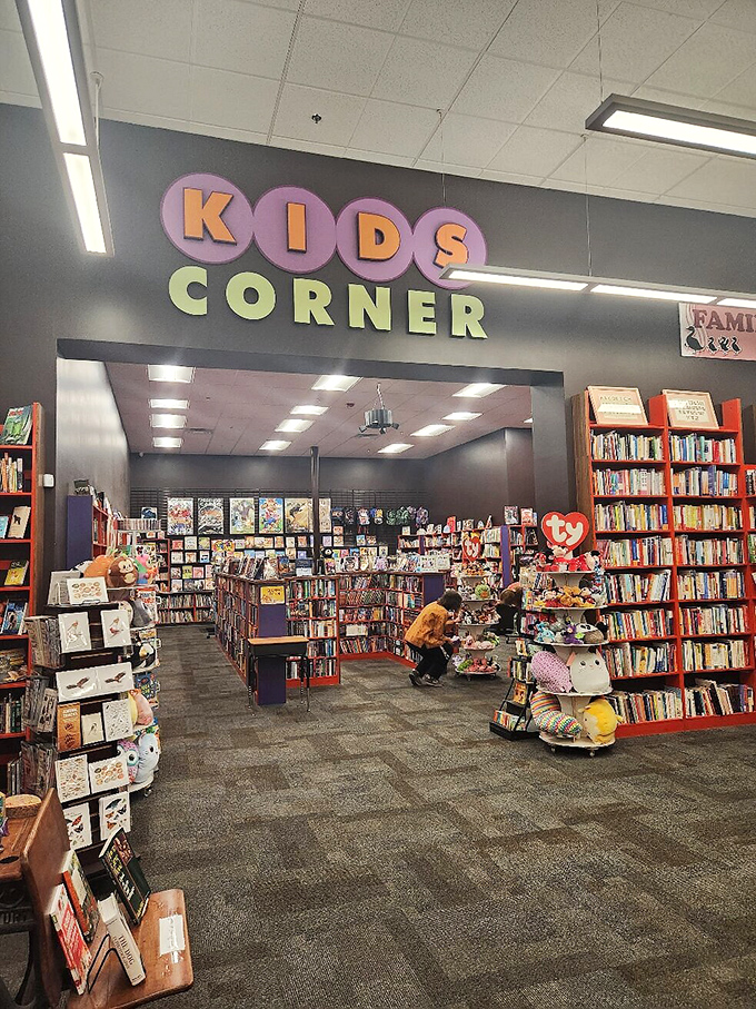 The Kids Corner: where young readers discover that stories existed before tablets, and stuffed animals patiently wait for their next adventure companion.
