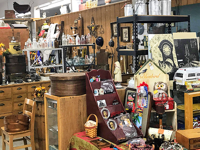A collector's fever dream where wooden barrels meet vintage frames. This booth is where minimalists come to repent and maximalists come to worship.