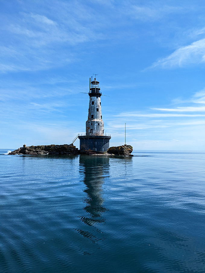 Standing sentinel since 1855, this weathered lighthouse has witnessed countless storms and sunrises. Lake Superior's solitary guardian, still keeping watch after all these years.