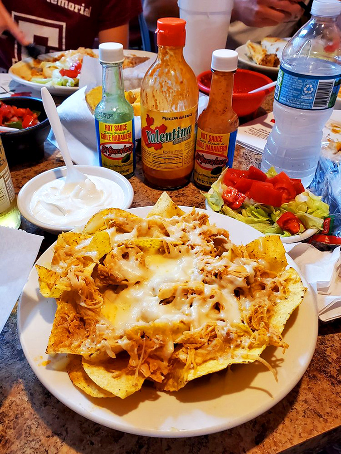 Nachos that require a structural engineer's approval&mdash;layers of melted cheese, seasoned chicken, and all the fixings create the Taj Mahal of Tex-Mex architecture.