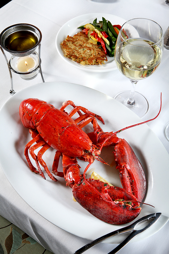 This lobster isn't just a meal, it's a crimson celebration that makes you wonder why you ever settled for fish sticks.