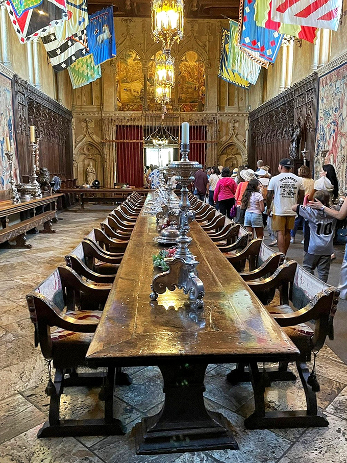 Medieval meets Hollywood in the Refectory, where a table fit for King Arthur awaits guests beneath colorful heraldic banners and priceless tapestries.