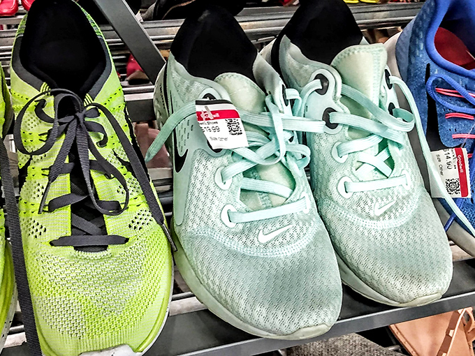 Athletic shoes lined up like eager contestants on a dating show, each hoping you'll take them home for a second chance at adventure.