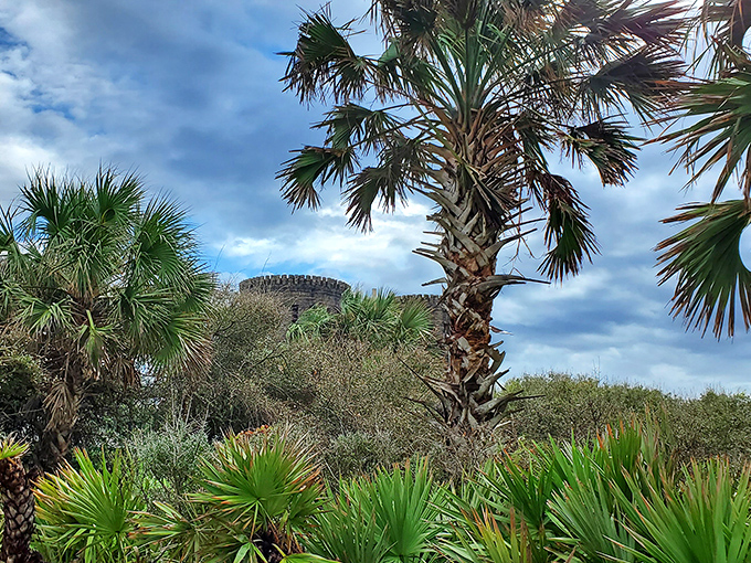 Nestled among Florida's native palms, the castle creates an enchanting contrast between Old World and tropics.