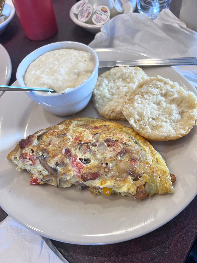 Behold the omelet of your dreams&mdash;perfectly folded, generously stuffed, and paired with a biscuit that would make your grandmother jealous