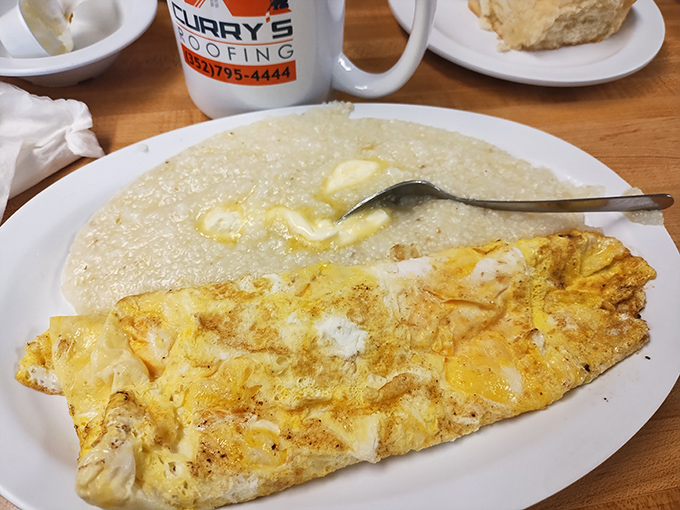 Behold the star of our show: an omelet so perfectly executed it makes you question whether you've ever truly experienced eggs before.