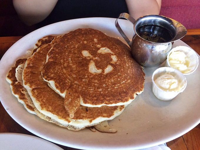 Pancakes so perfectly golden they belong in the breakfast hall of fame. That little puddle of melting butter? Pure morning poetry. 