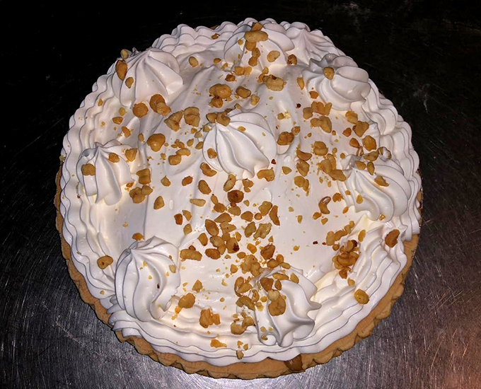 Cloud-like whipped cream crowned with peanut crumbles&mdash;this pie doesn't just satisfy a sweet tooth, it throws a party for it.