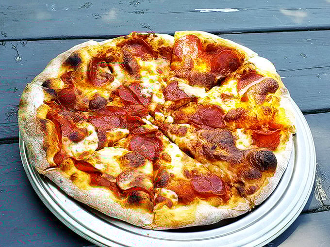 Pizza perfection doesn't need fancy words&mdash;just look at those crispy-edged pepperoni cups cradling little pools of savory magic.