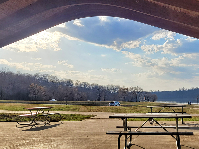 Picnic with a view! These tables beneath the wooden shelter frame East Fork Lake like a postcard waiting to happen.