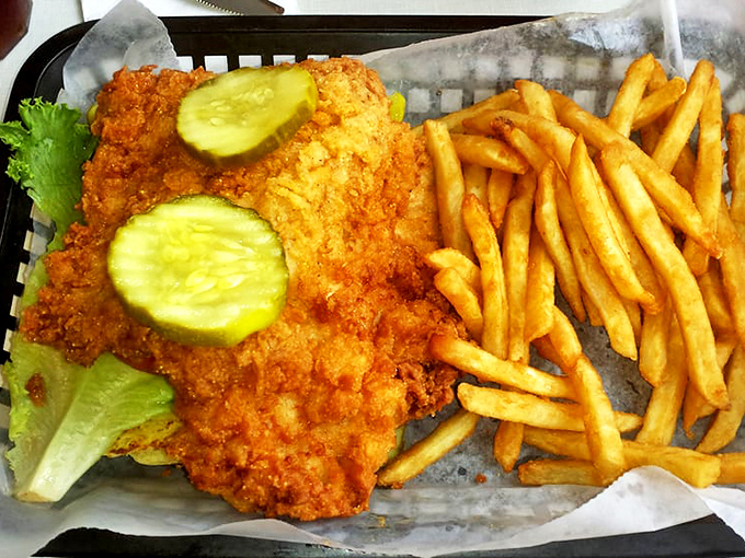 Behold Indiana's edible state flag&mdash;a perfectly golden pork tenderloin that laughs at the concept of "fitting on a plate" while maintaining its crispy dignity.
