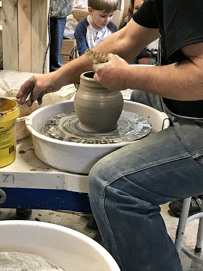Pottery in Progress: Hands shape clay into possibility while a young observer learns that some of life's most satisfying creations happen without a charging port or Wi-Fi.