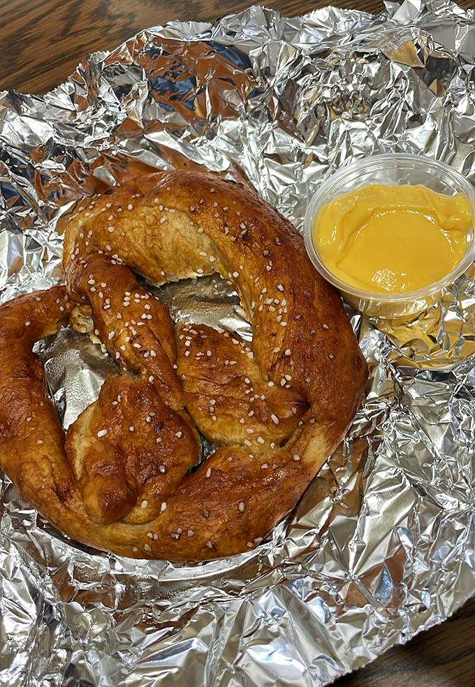 This golden pretzel with mustard proves that simple pleasures often deliver the most satisfying experiences.